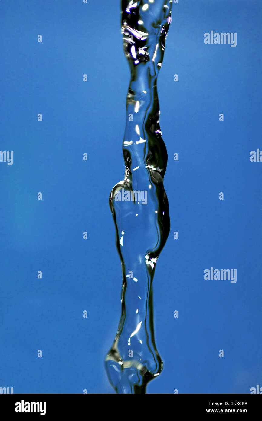Blue water drop falling down hi-res stock photography and images - Alamy