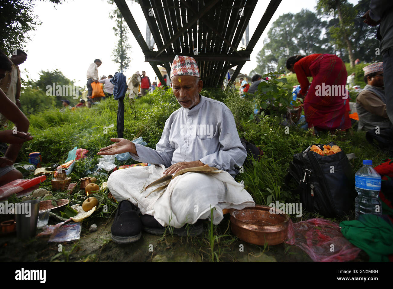 Kathmandu, Nepal. 1st Sep, 2016. A Nepalese Hindu priest perform ...