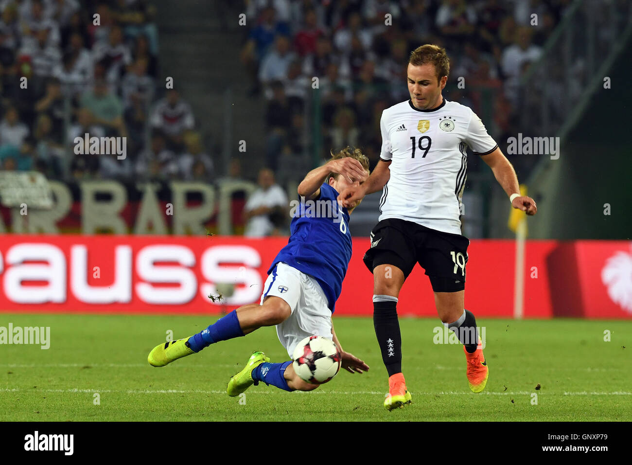 Moenchengladbach, Germany. 31st Aug, 2016. Germany's Mario Goetze (r ...