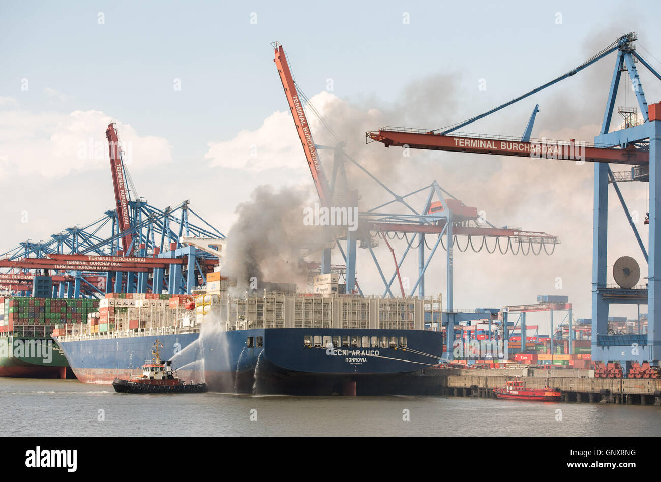 Hamburg, Germany. 01st Sep, 2016. A fire-fighting boat fights a fire on ...