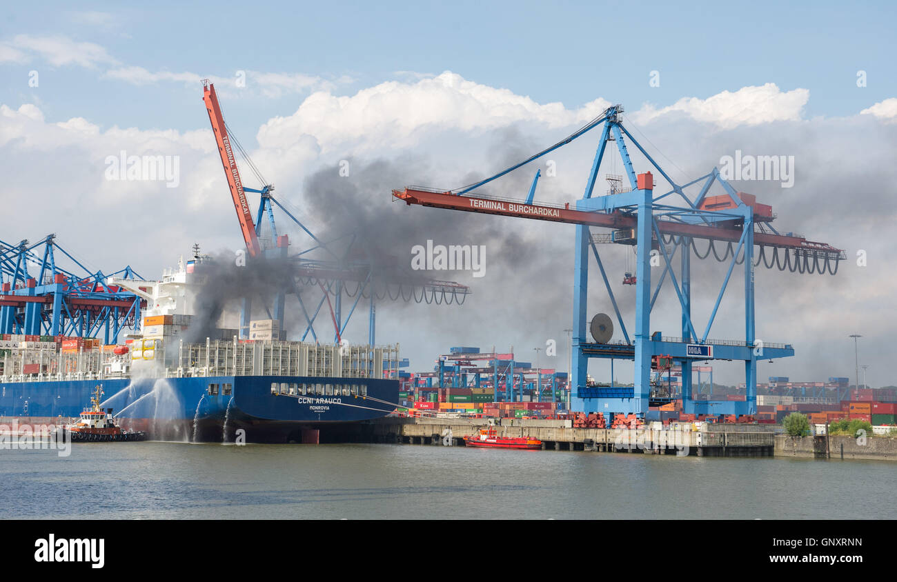 Hamburg, Germany. 01st Sep, 2016. Fire-fighting boats fight a fire on a ...