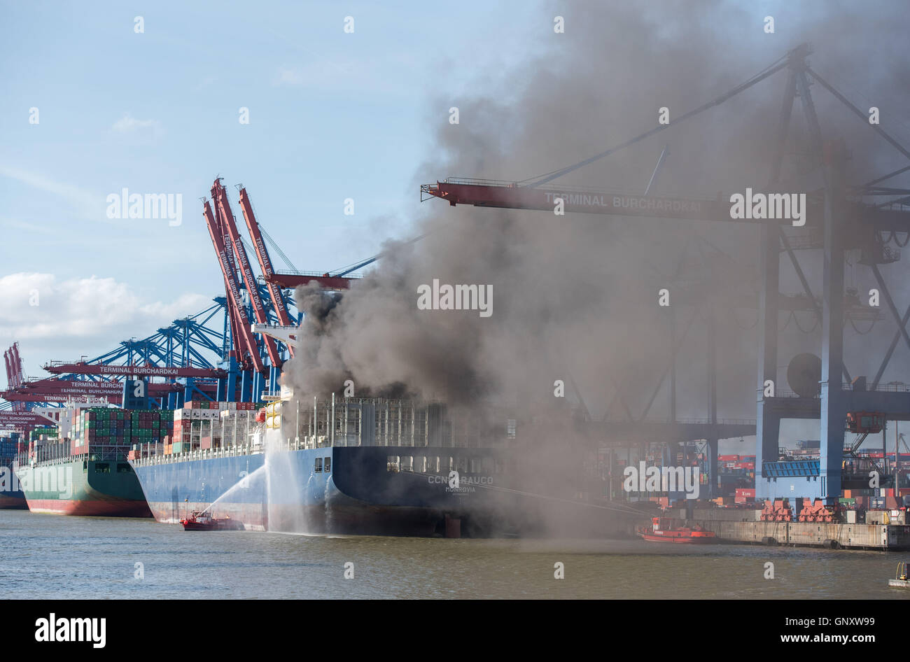 Hamburg, Germany. 01st Sep, 2016. A fire-fighting boat fights a fire on ...
