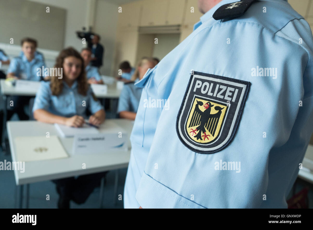 Bamberg, Germany. 01st Sep, 2016. Police sergeant candidates sit in a ...