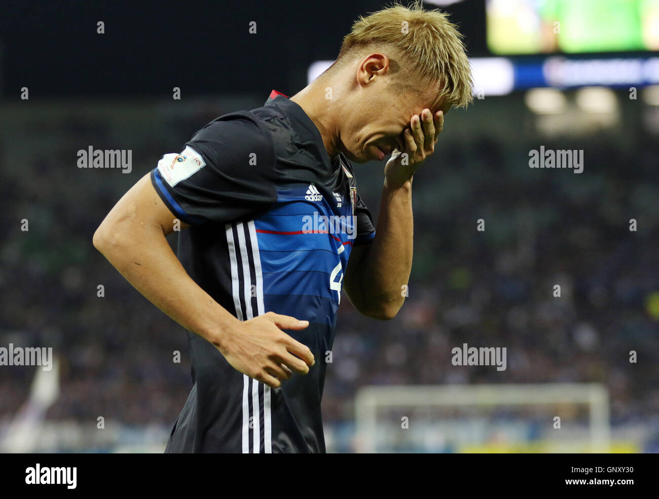 Saitama, Japan. 1st Sep, 2016. Japan's Keisuke Honda covers his face ...