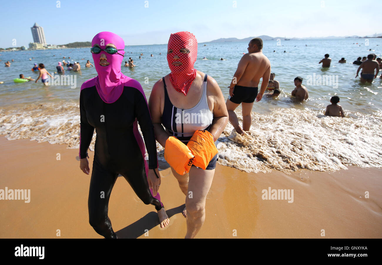 Women wearing face protection from the sun hi-res stock photography and ...