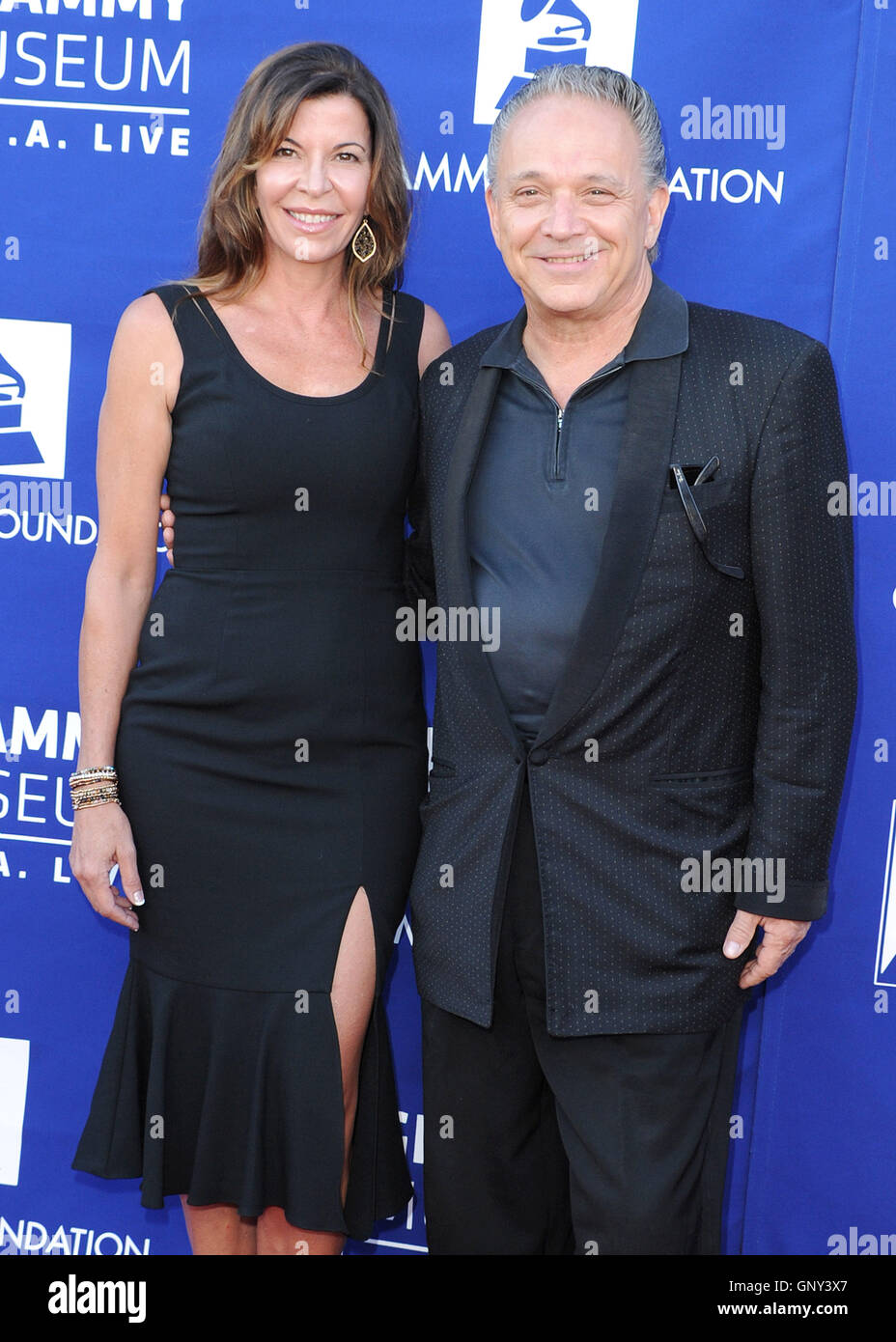 BEVERLY HILLS, CA - SEPTEMBER 1: Jimmie Vaughan and Robin Vaughan at ...