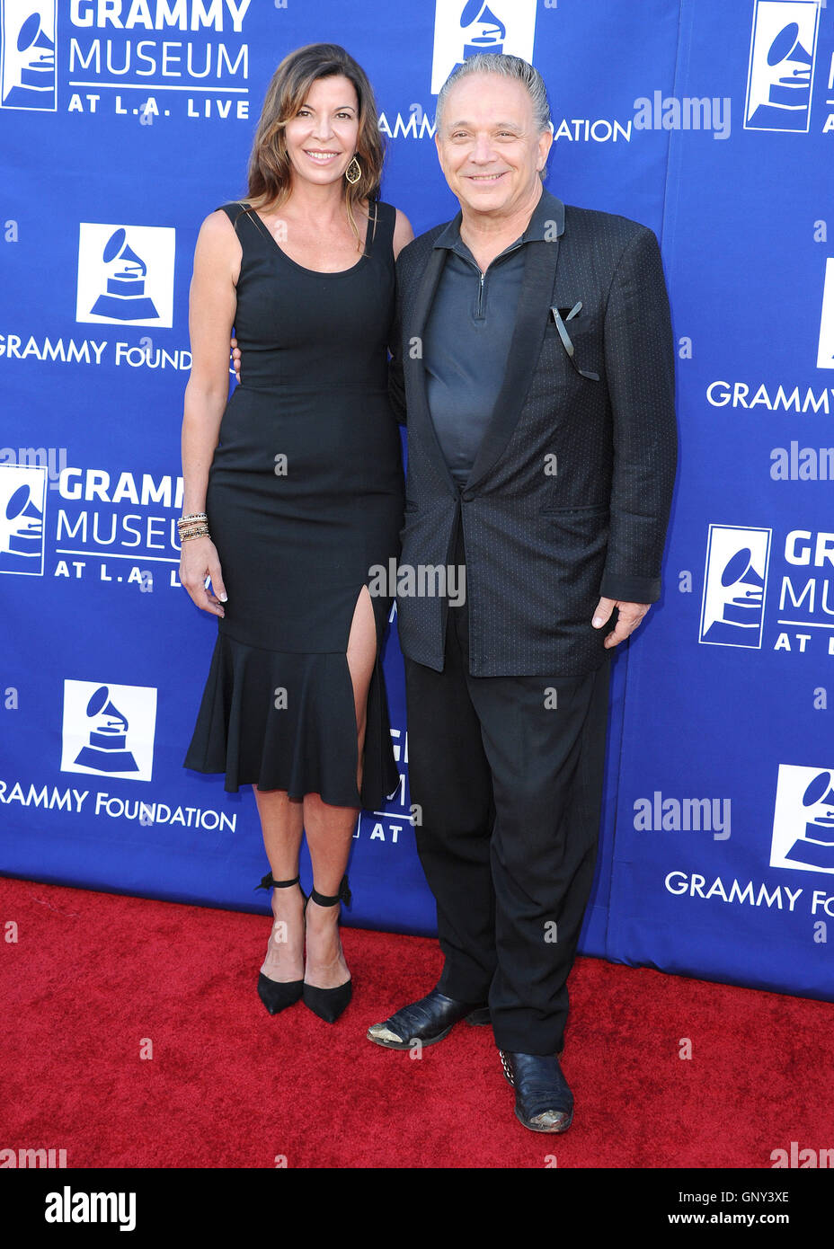 BEVERLY HILLS, CA - SEPTEMBER 1: Jimmie Vaughan and Robin Vaughan at ...
