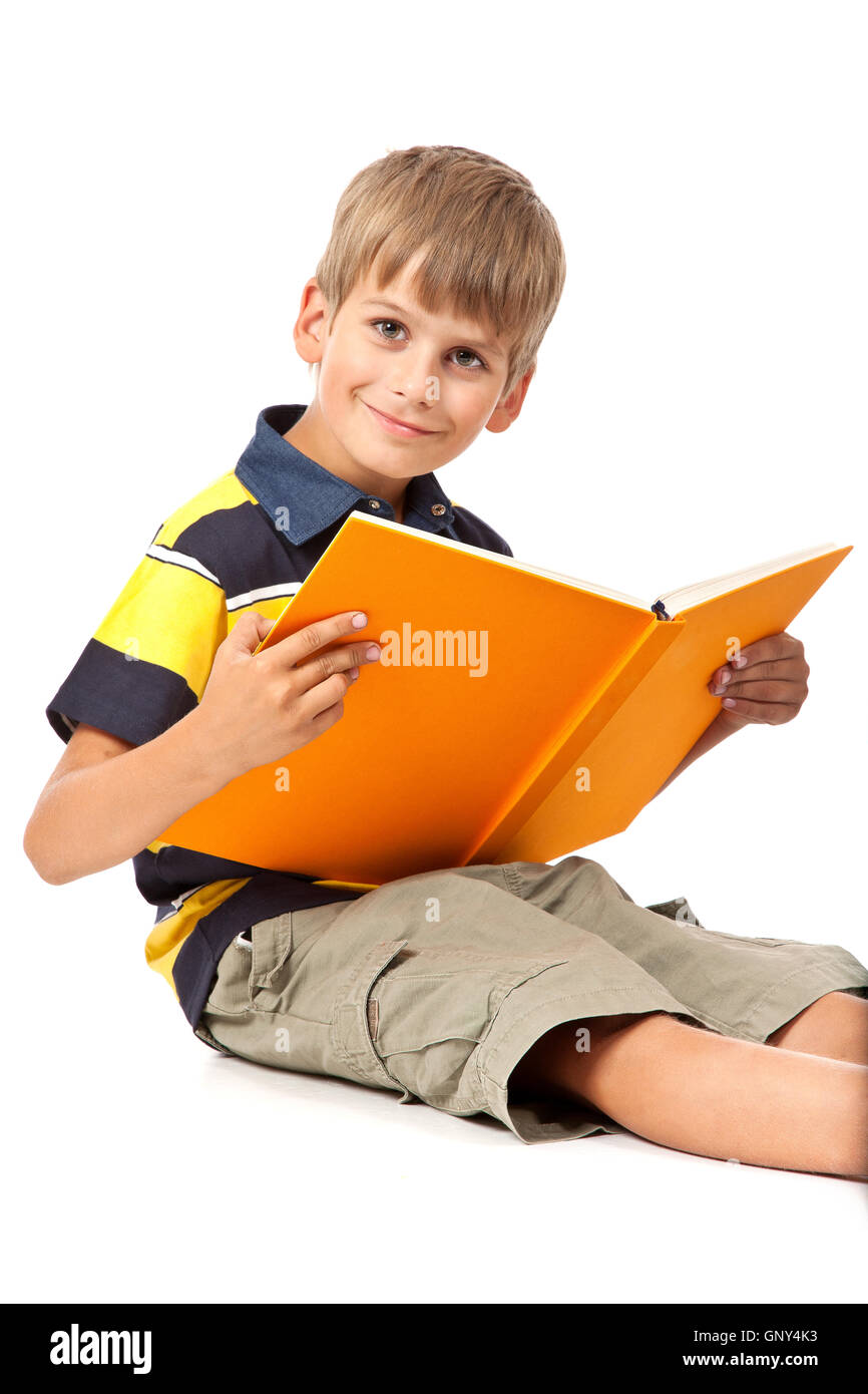 Schoolboy is holding a book on white Stock Photo - Alamy