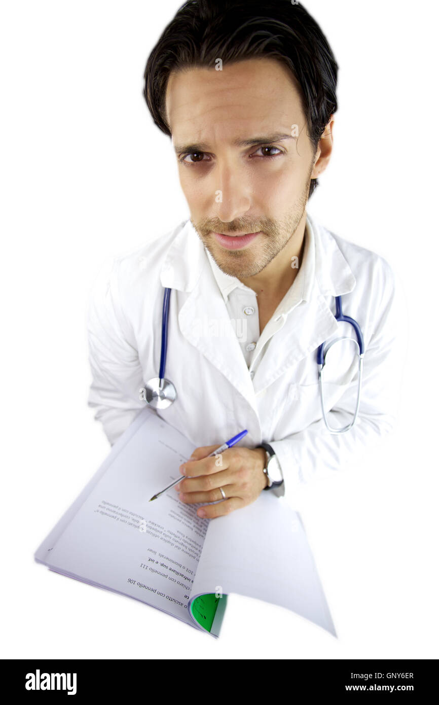 Handsome serious doctor writing paper Stock Photo - Alamy