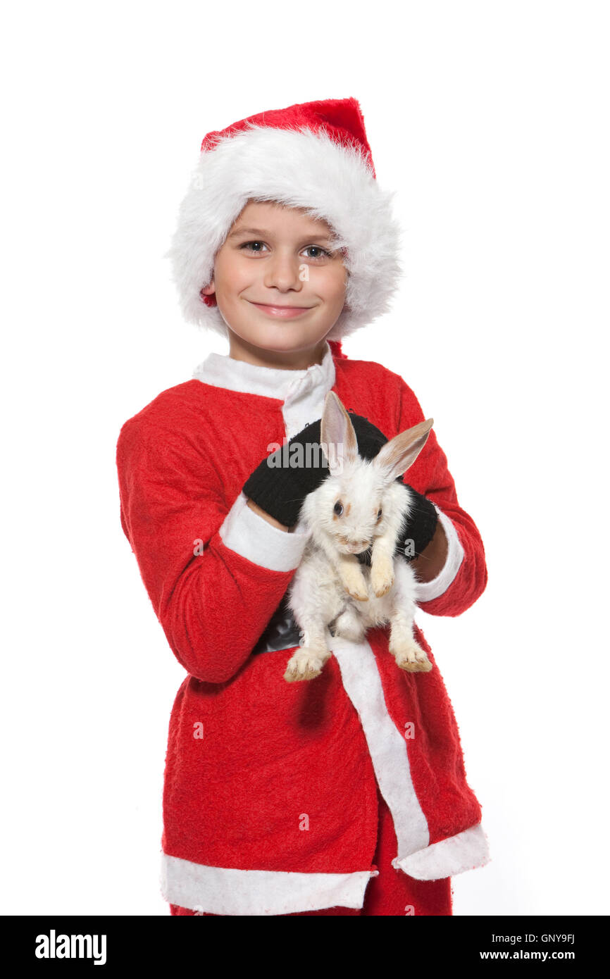 Boy holding a christmas rabbit Stock Photo - Alamy