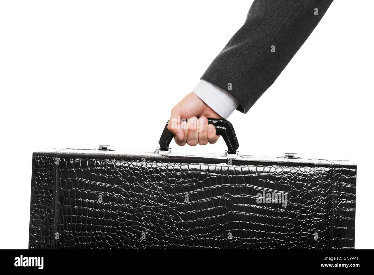 Hand holding suitcase Stock Photo - Alamy