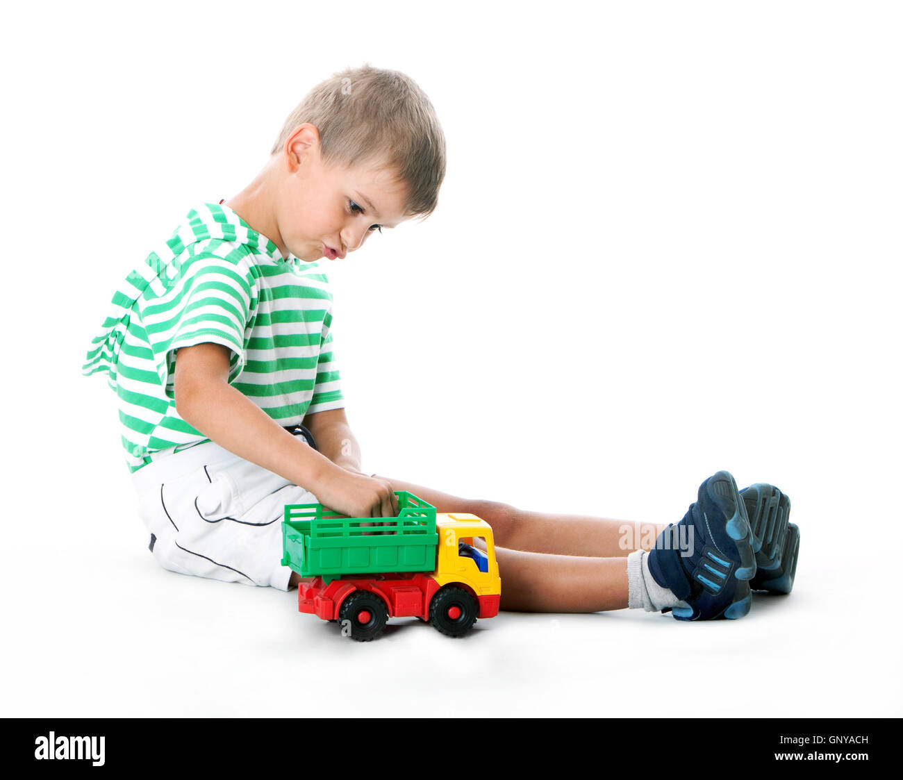 Boy play toy car Cut Out Stock Images & Pictures - Alamy