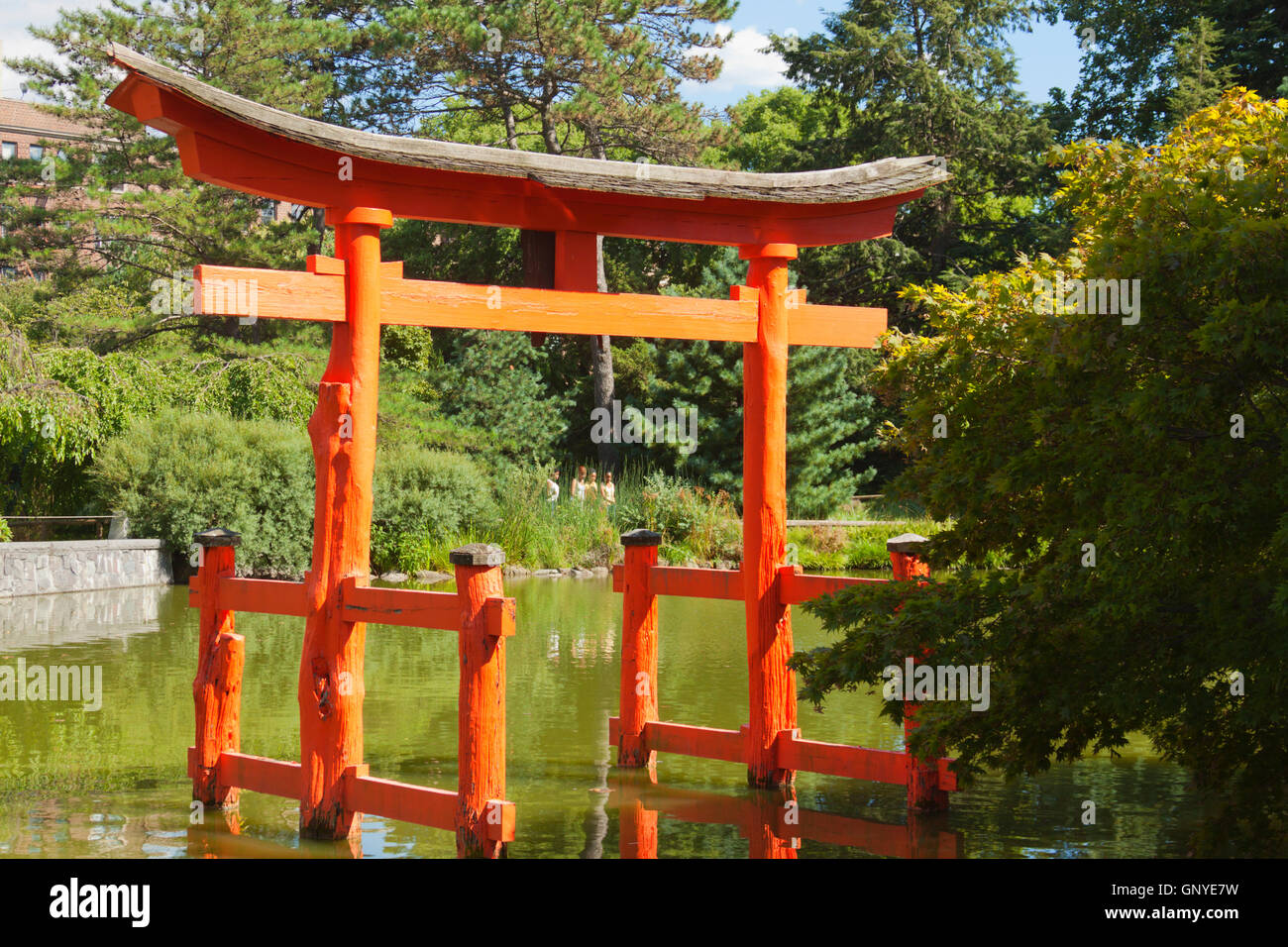 Japanese Garden and pond with a red Zen Tower Stock Photo - Alamy