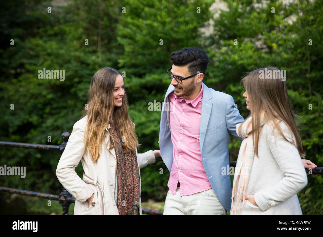 Group of Three Friends outdoors in urban city. Caucasian lifestyle ...