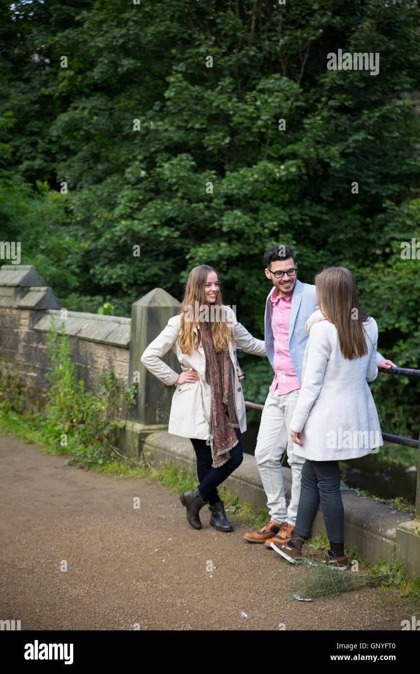 Group of Three Friends outdoors in urban city. Caucasian lifestyle ...