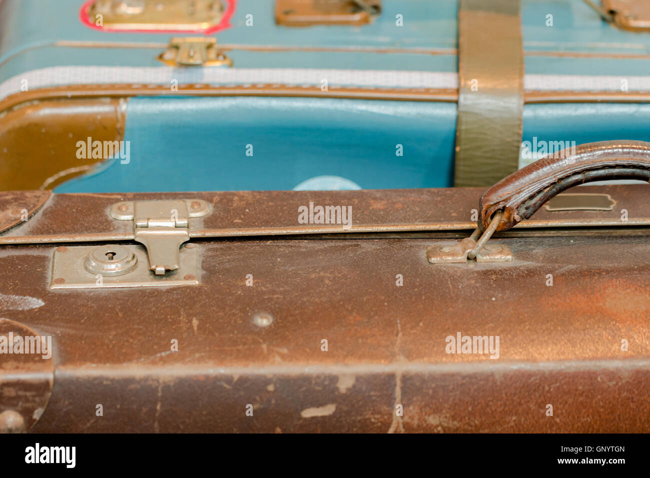 vintage luggage with a lock and a rusty handle Stock Photo - Alamy