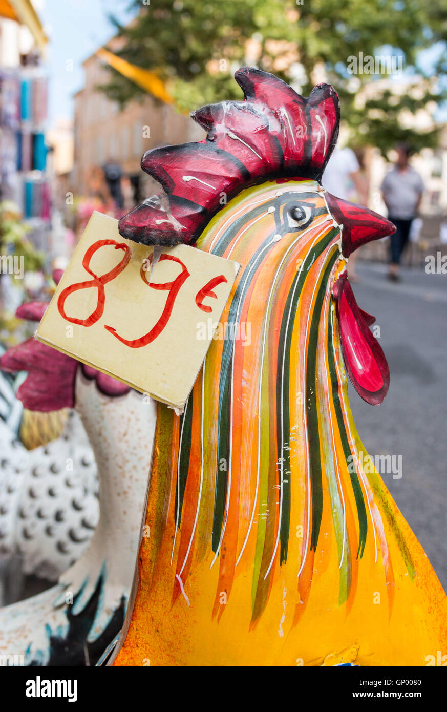 colourful model of cockerel in a French market Stock Photo - Alamy