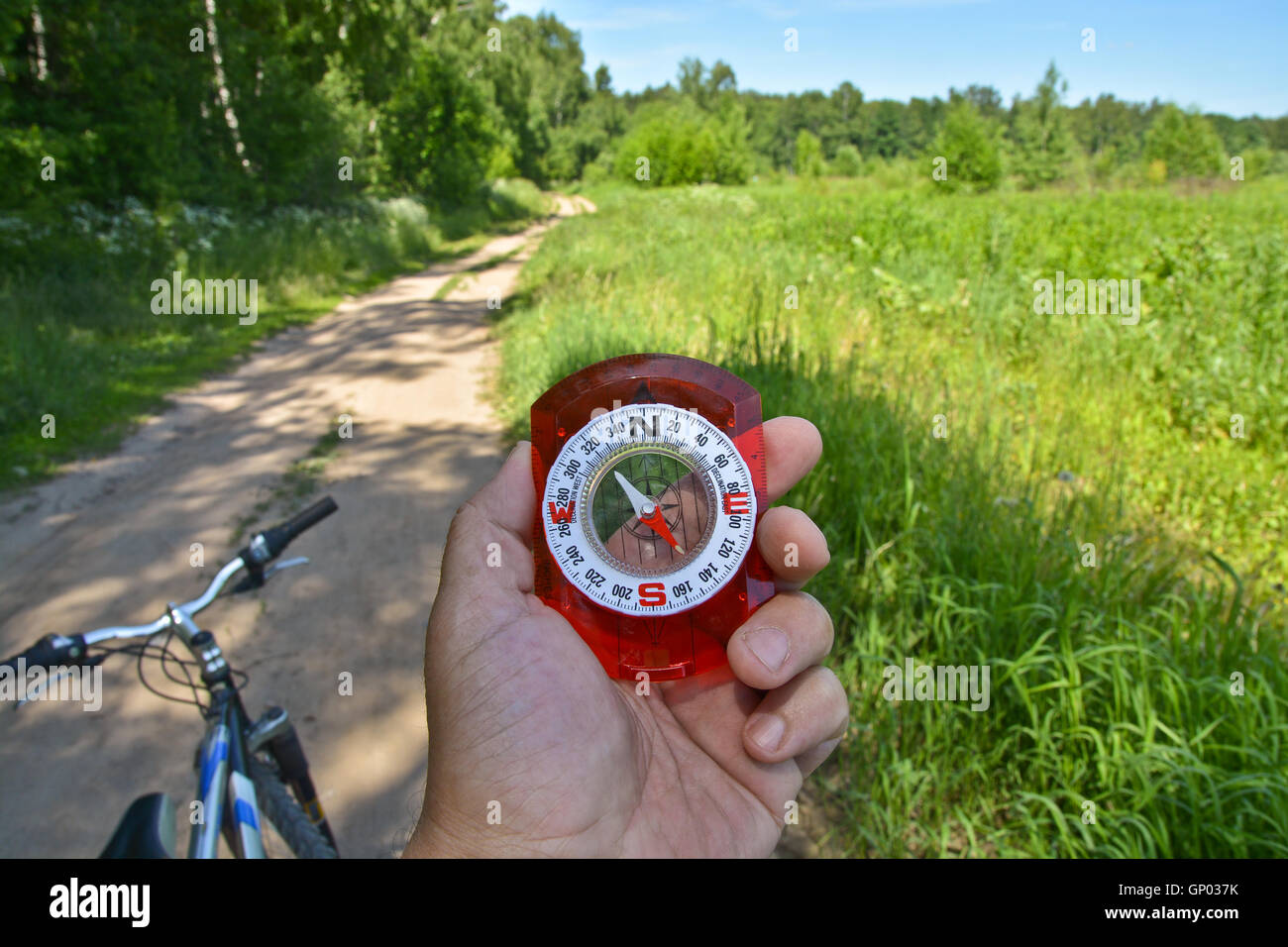 Magnetic compass in hand traveler. Tools to guide in the journey Stock ...