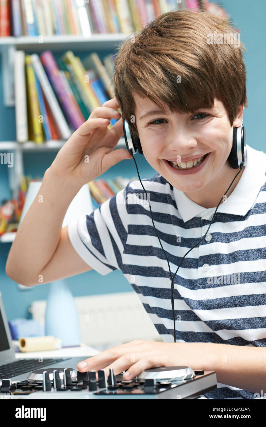Teenage Boy Mixing Music In Bedroom Stock Photo - Alamy