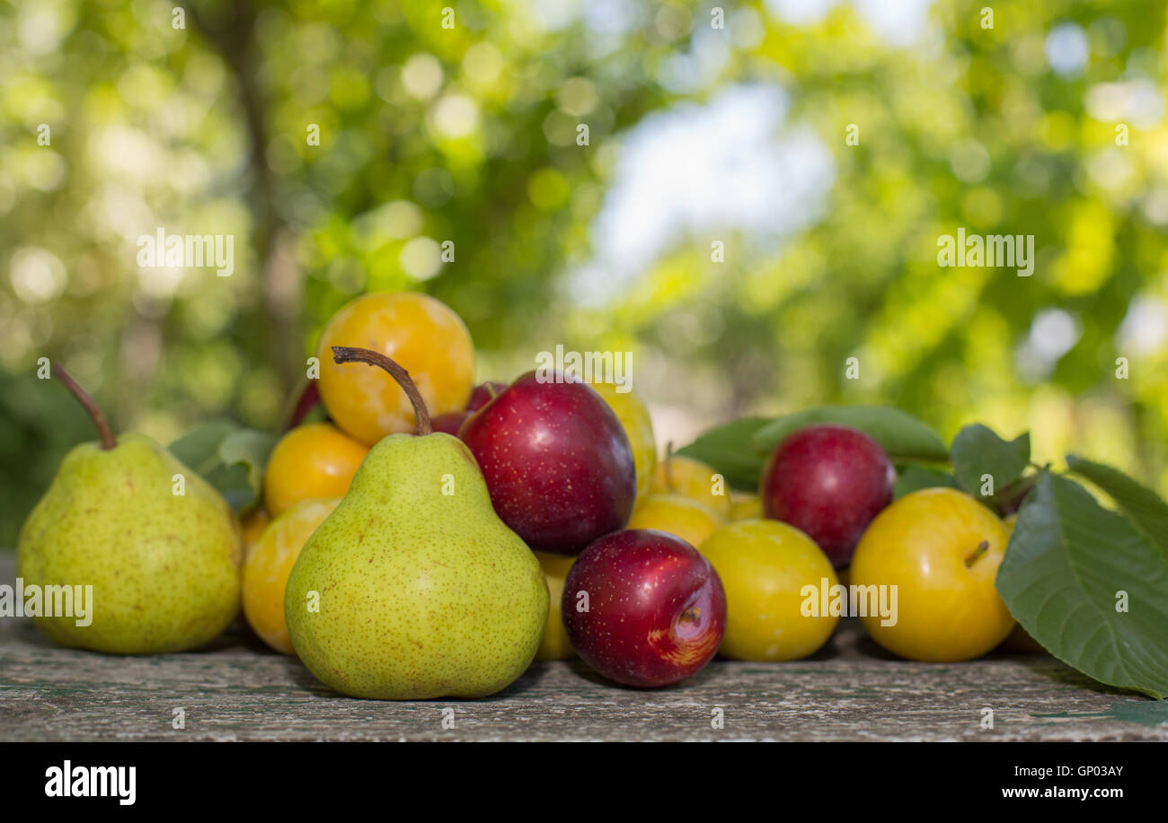 fruits in wooden table, outdoor Stock Photo - Alamy