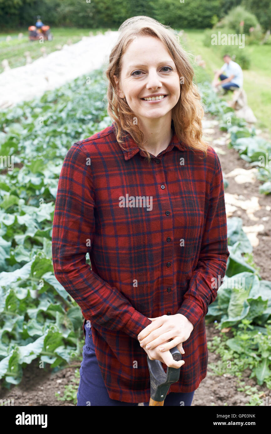 Portrait Of Farm Workers In Organic Field Stock Photo - Alamy