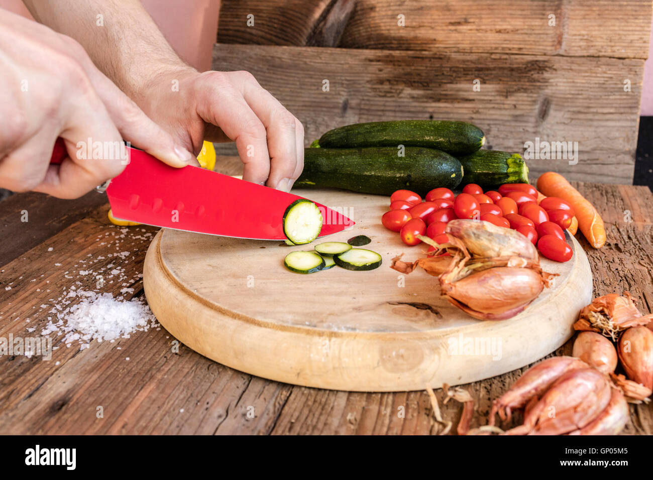 Chef cuts fresh vegetables essential ingredients of typical and healthy ...
