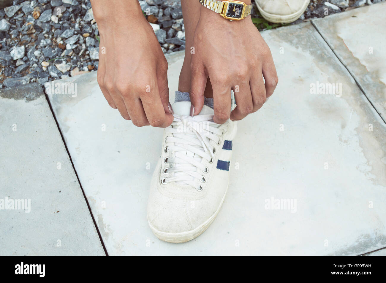 Doing up shoe laces hi-res stock photography and images - Alamy