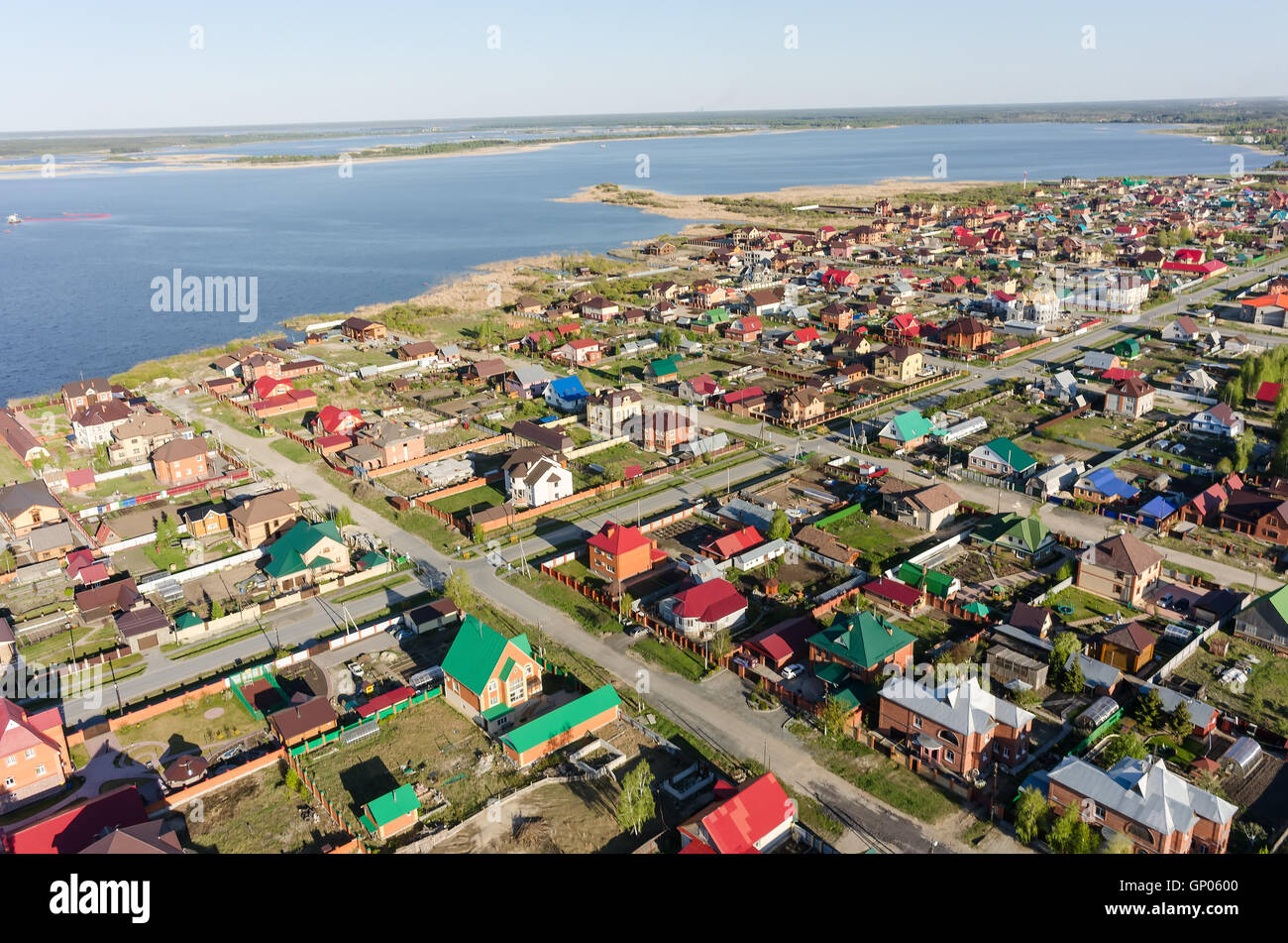 Aerial view onto private houses on bank of lake Stock Photo - Alamy
