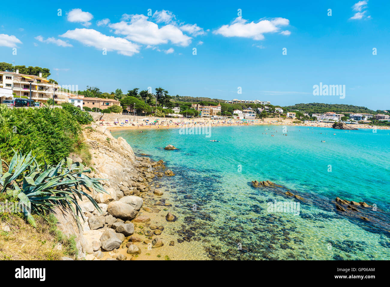 Overview of La Fosca beach full of bathers in Costa Brava, Catalonia ...