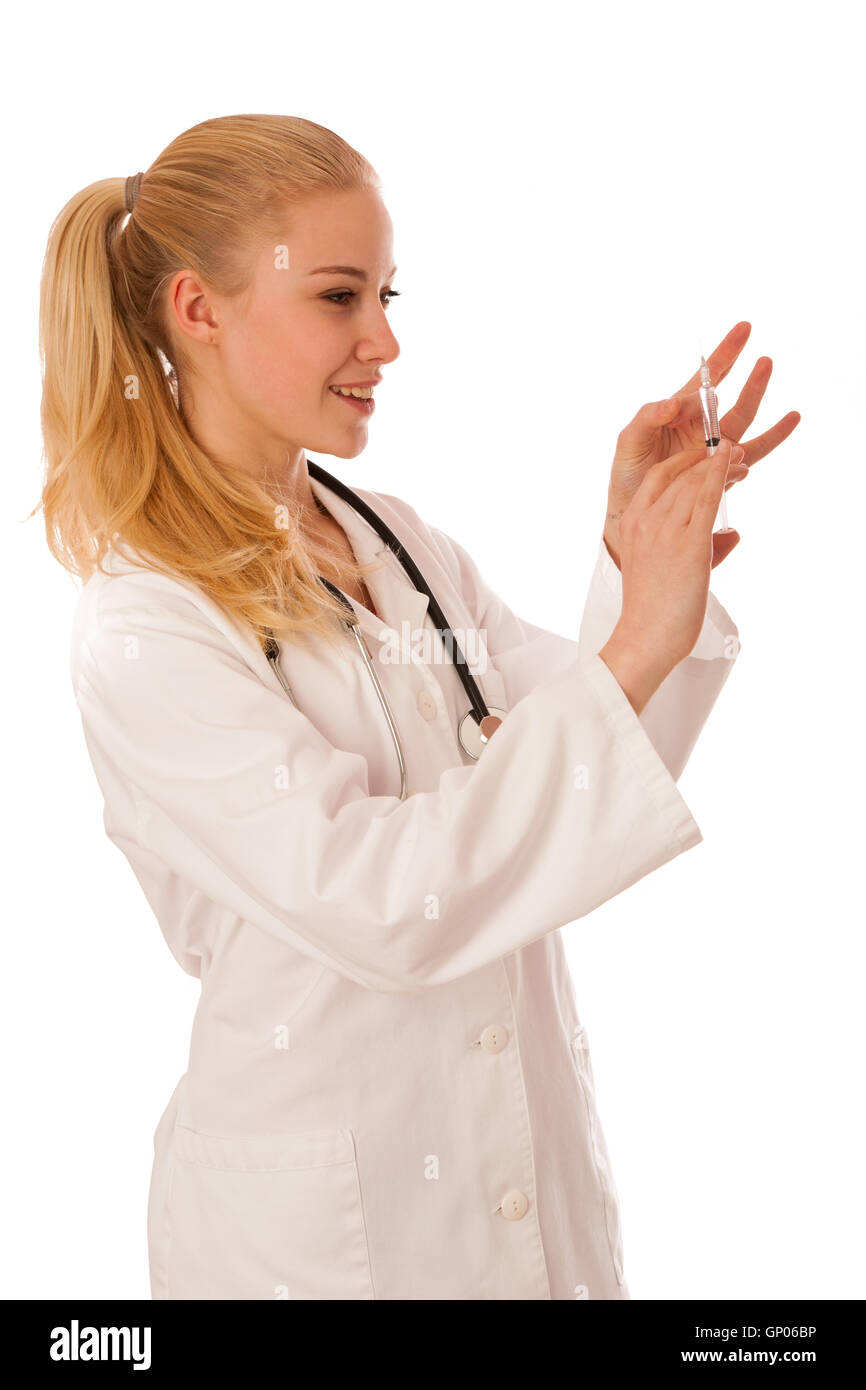 Doctor with stethoscope around neck and needle in hand promoting cure ...