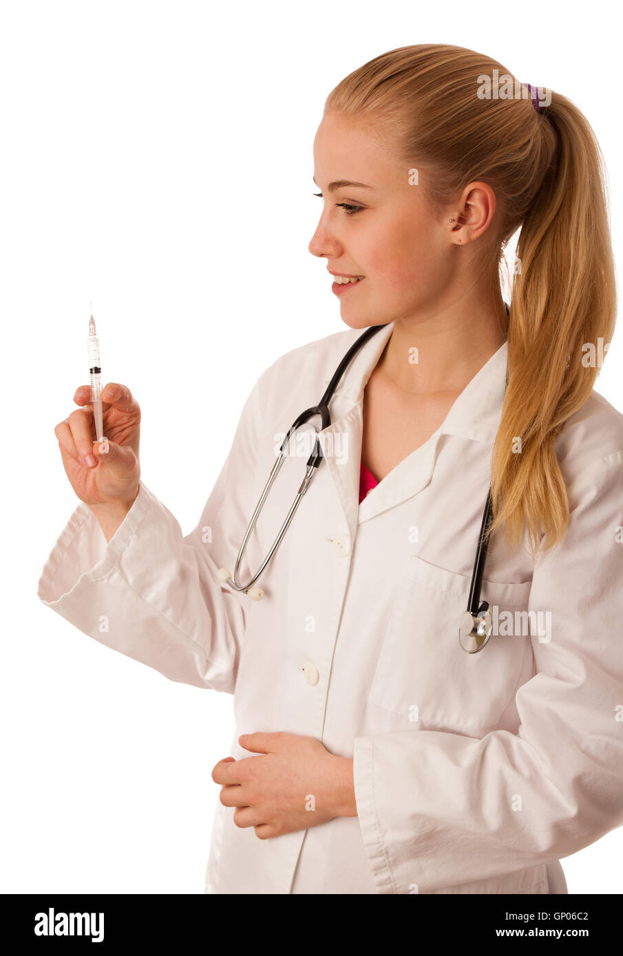 Doctor with stethoscope around neck and needle in hand promoting cure ...