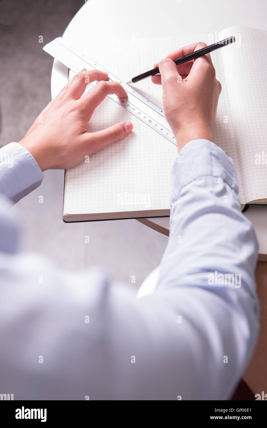 view over the shoulder of an female engineer drawing Stock Photo - Alamy