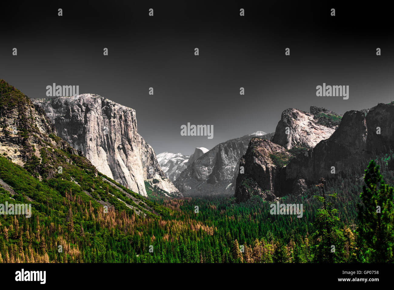 Dark dramatic depiction of Yosemite National Park at iconic Valley View ...