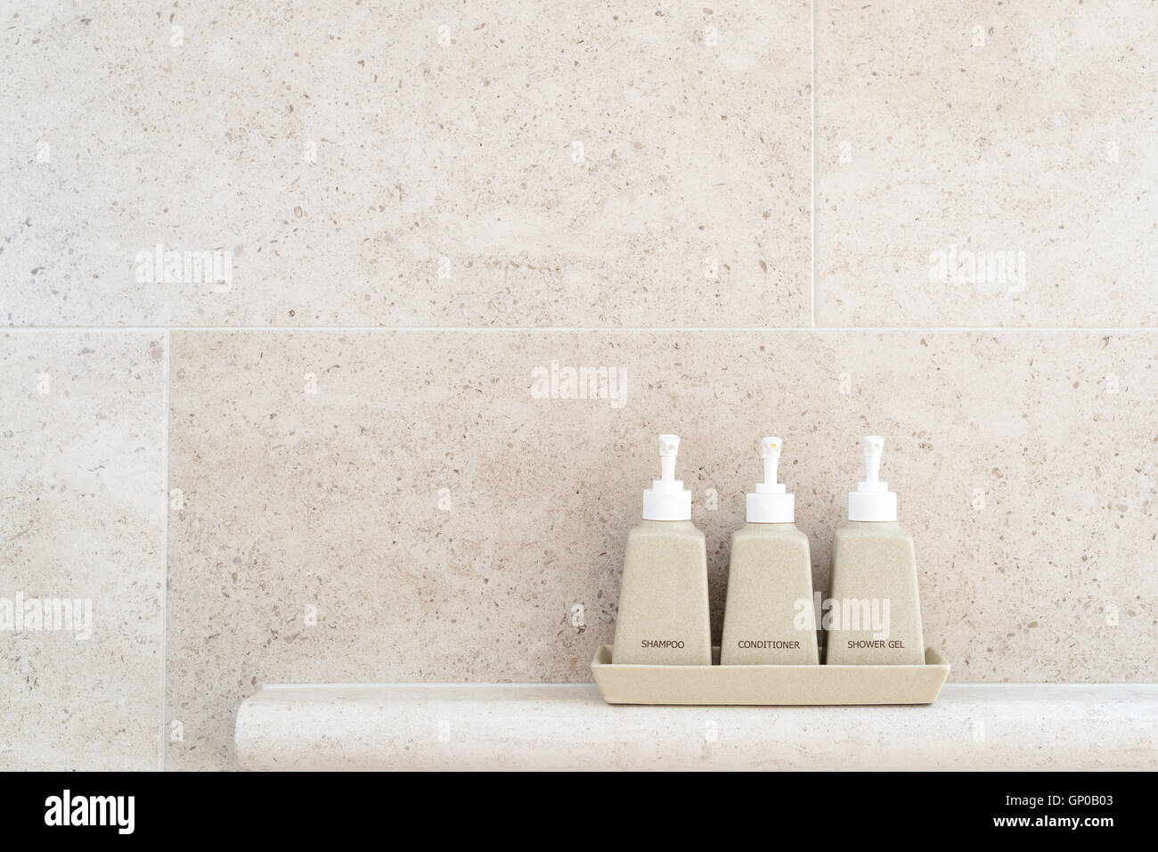 Toiletries tube in a luxury hotel, shower gel, shampoo and hair ...