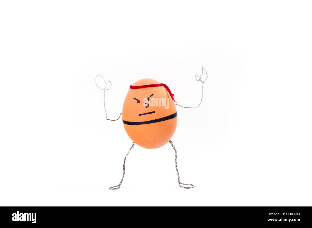Karate chicken egg shell person with angry face and red rope on head ...