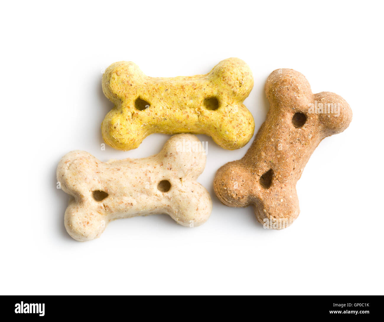 Dog food shaped like bones isolated on white background Stock Photo - Alamy