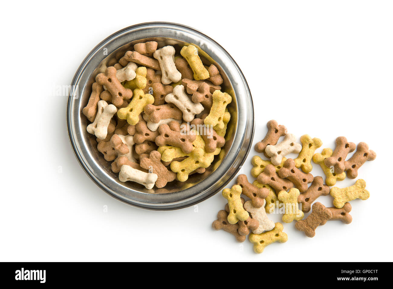 Dog food shaped like bones in bowl isolated on white background. Top ...