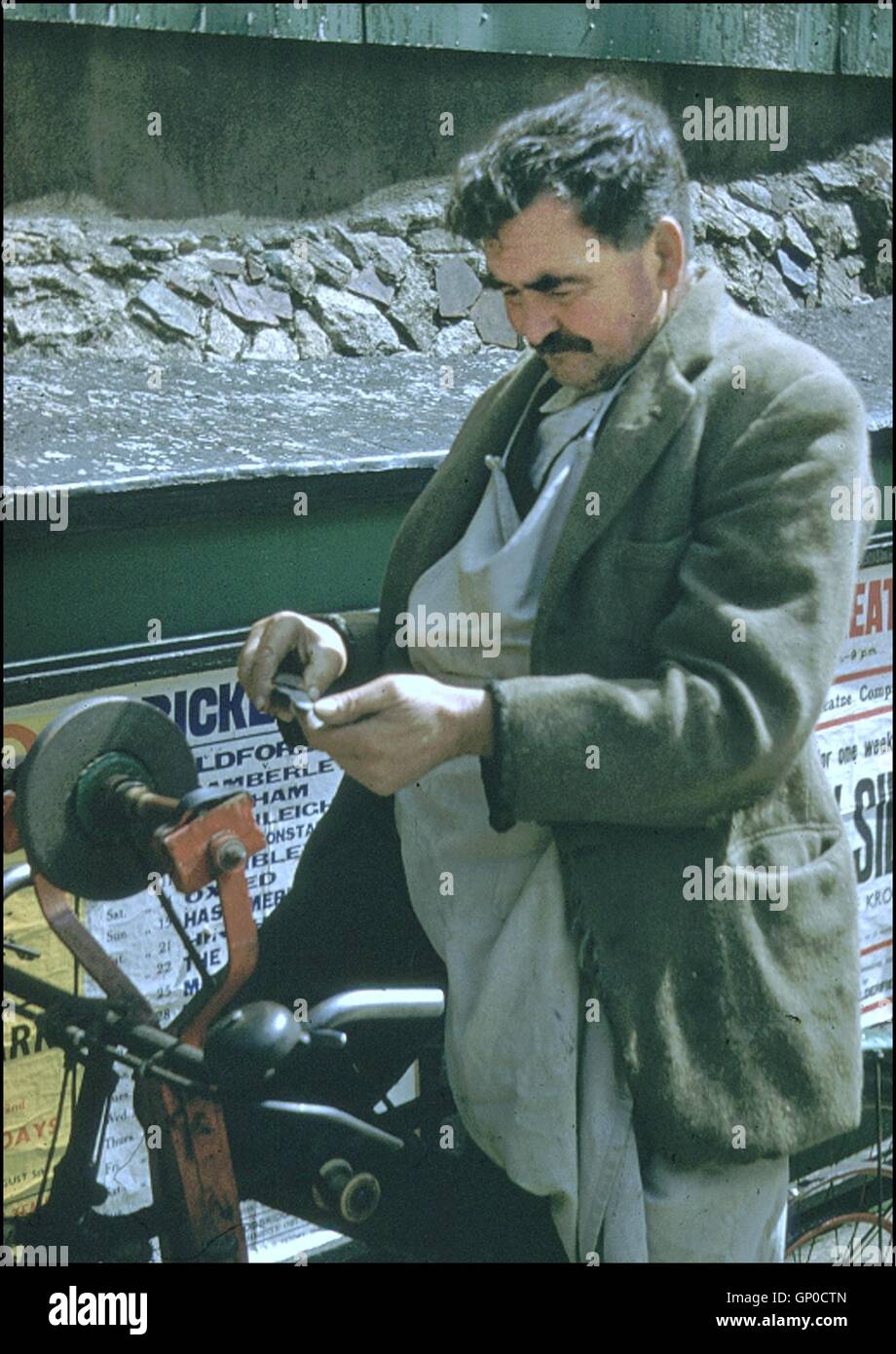 Workman and bicycle Stock Photo - Alamy
