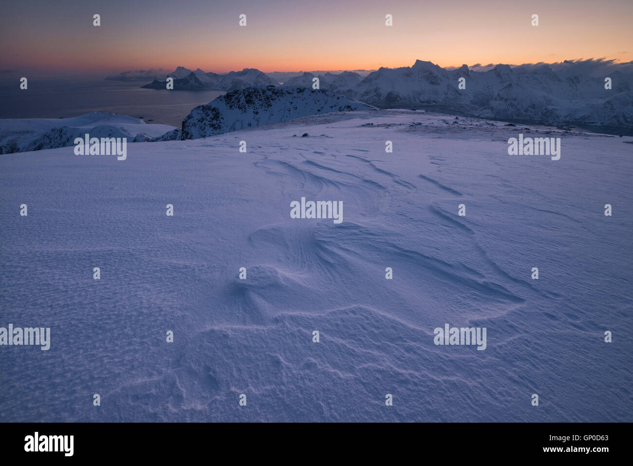 Winter dawn over mountain landscape from summit of Ryten, Moskenesøy ...