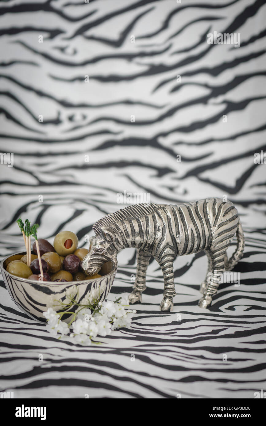 Zebra bowl on zebra print Stock Photo - Alamy