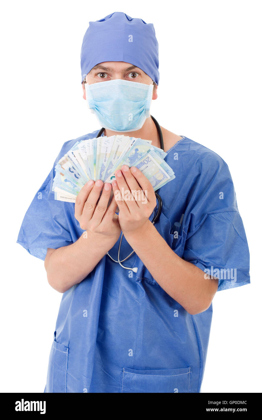 Happy male doctor holding bank notes, isolated Stock Photo - Alamy