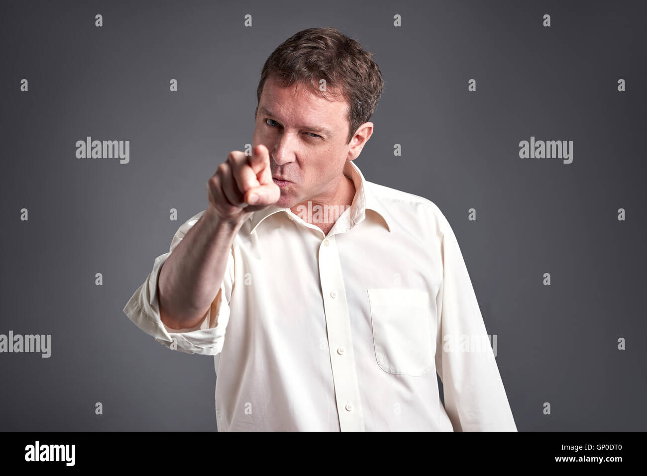 Portrait of a angry middle age man getting fury Stock Photo - Alamy