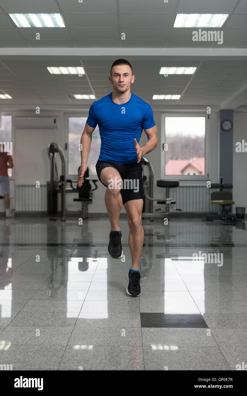 Young Man Doing Functional Workout At The Gym Jumping Around Stock ...