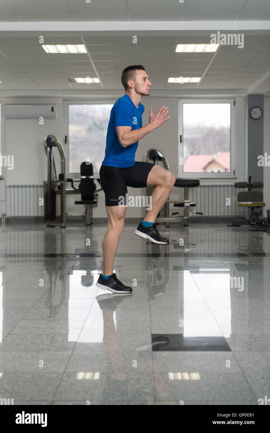 Young Man Doing Functional Workout At The Gym Jumping Around Stock ...