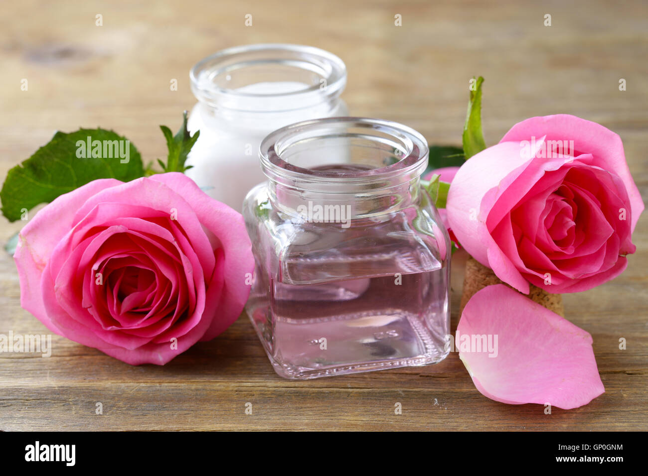 Natural organic cosmetics cream and rose water Stock Photo - Alamy