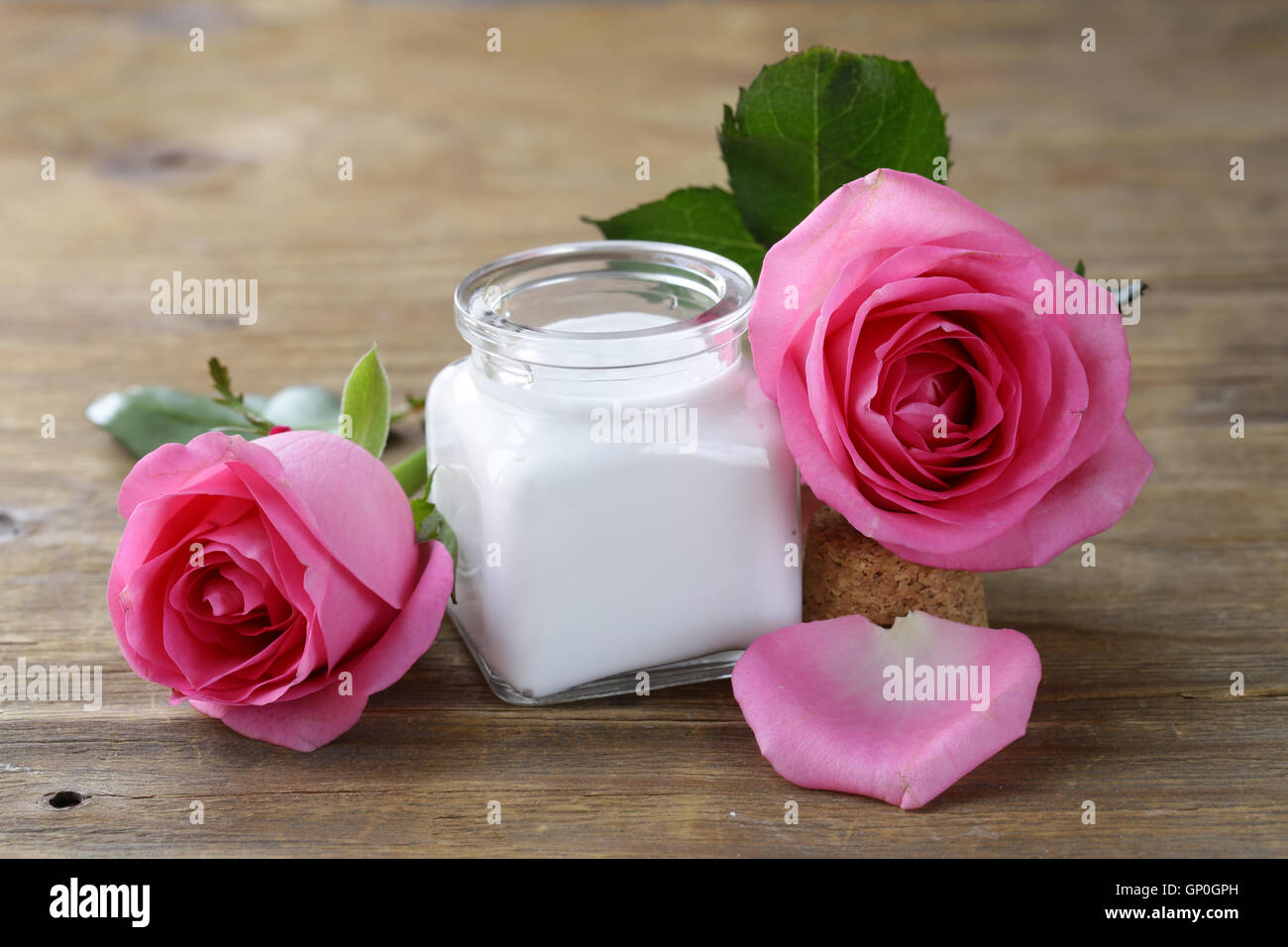 Natural organic cosmetics cream and rose water Stock Photo - Alamy