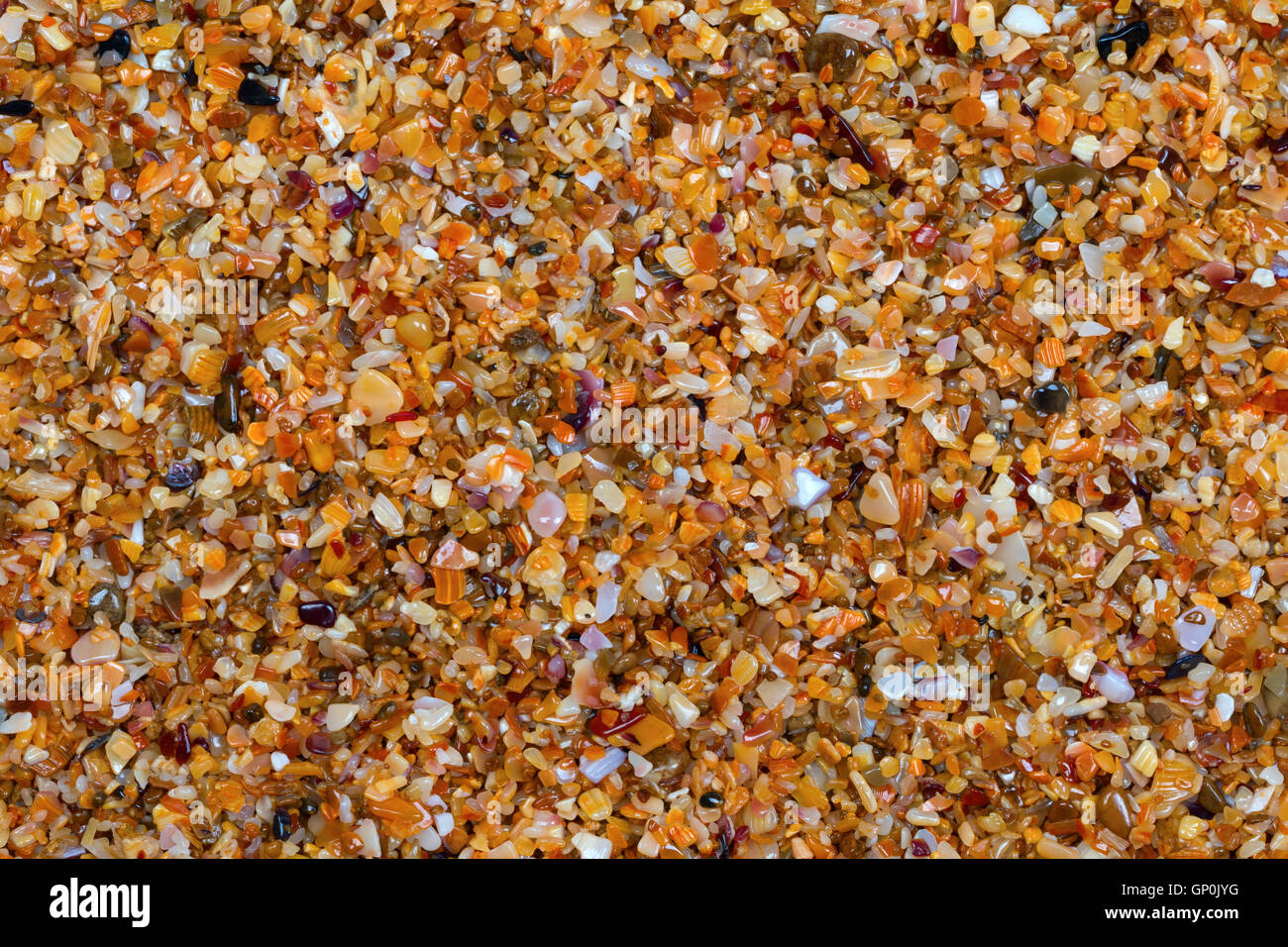 Multicolor sand on beach in sun summer day. View from above. Nature ...