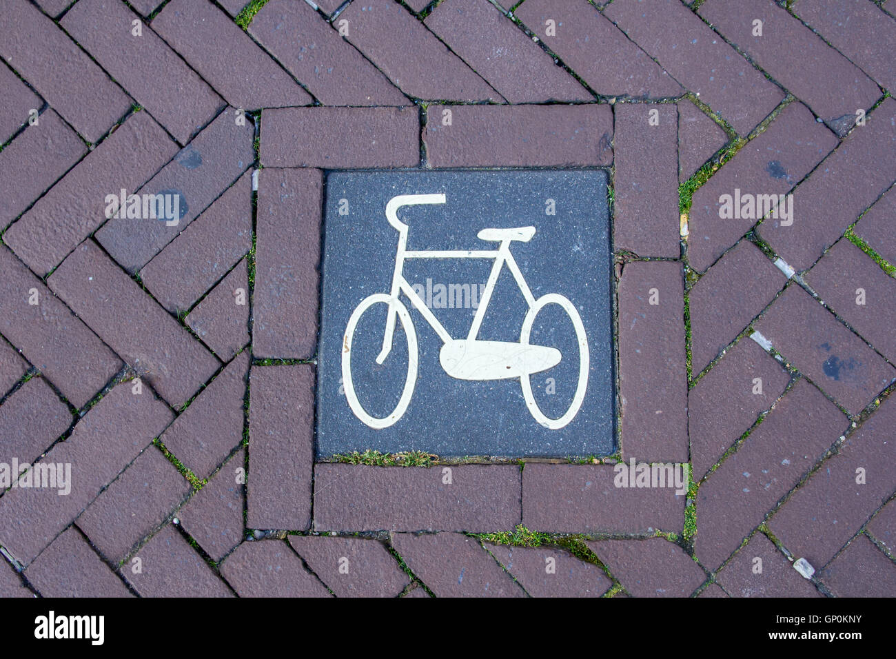 Amsterdam , the Netherlands - April 13, 2016: bike symbol on bike path ...