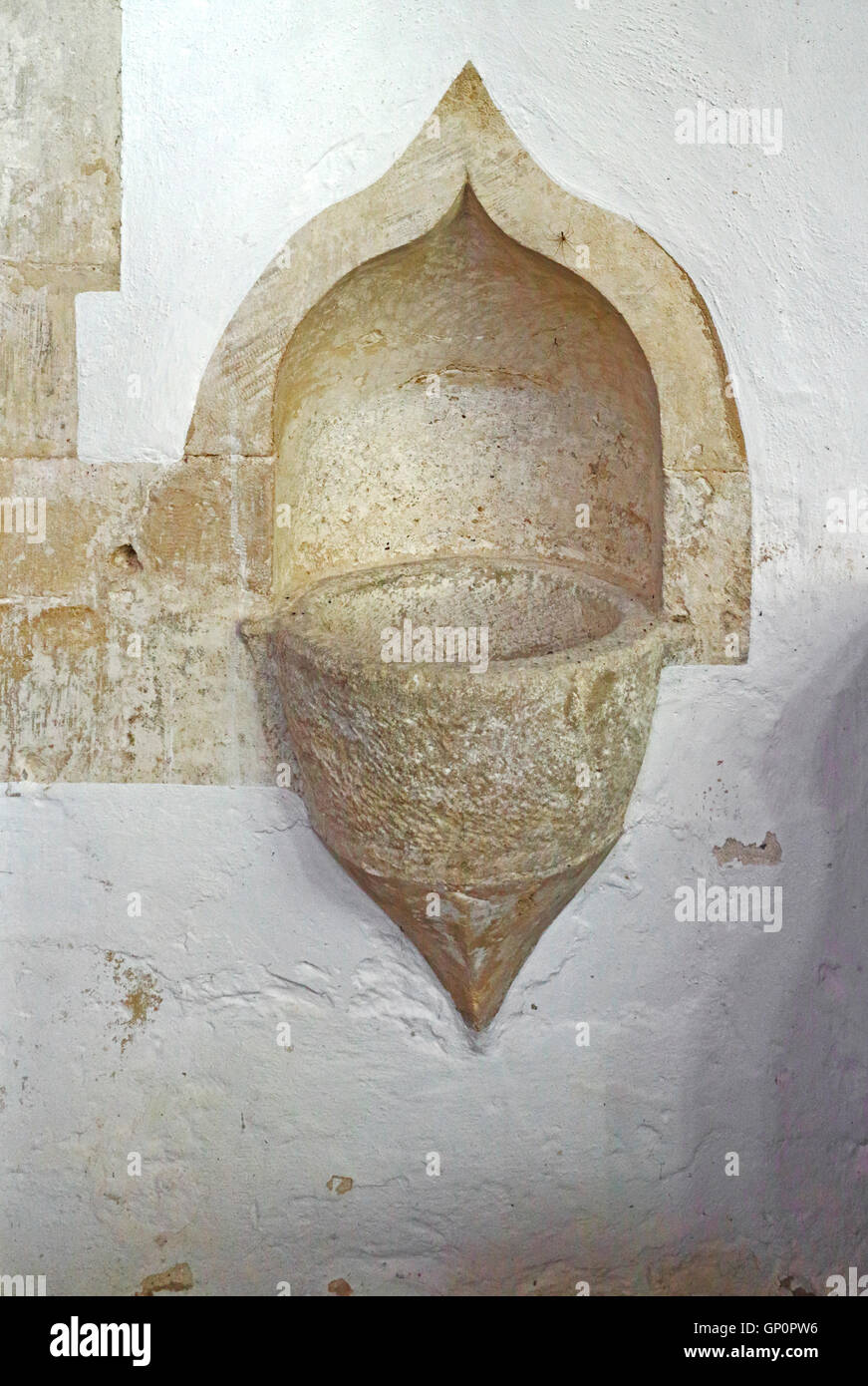 A holy water stoup by the north door of the parish church of St ...