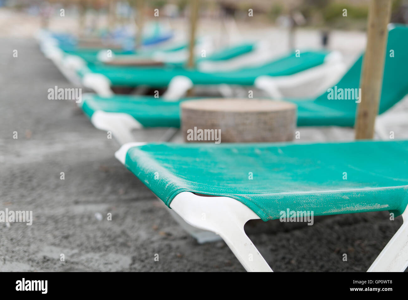 Plastic hammocks on a Spanish beach Stock Photo - Alamy